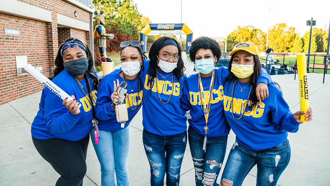 Spartans storm the streets, celebrate men’s basketball win - UNC Greensboro
