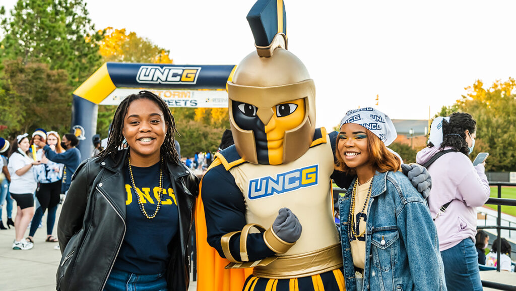 Spartans storm the streets, celebrate men’s basketball win - UNC Greensboro